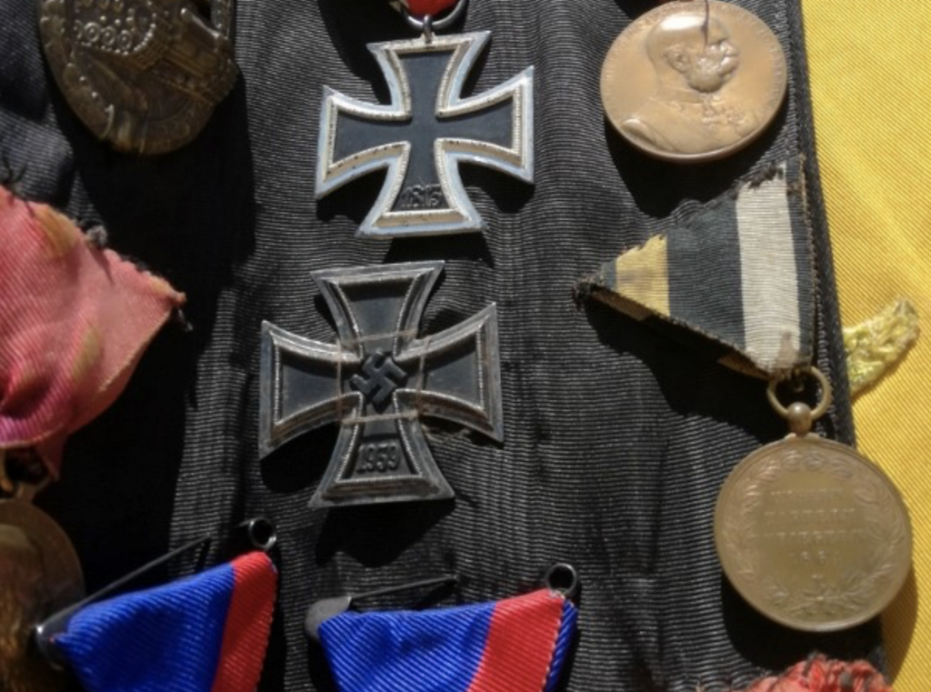 Comradeship association with swastika in front of a school